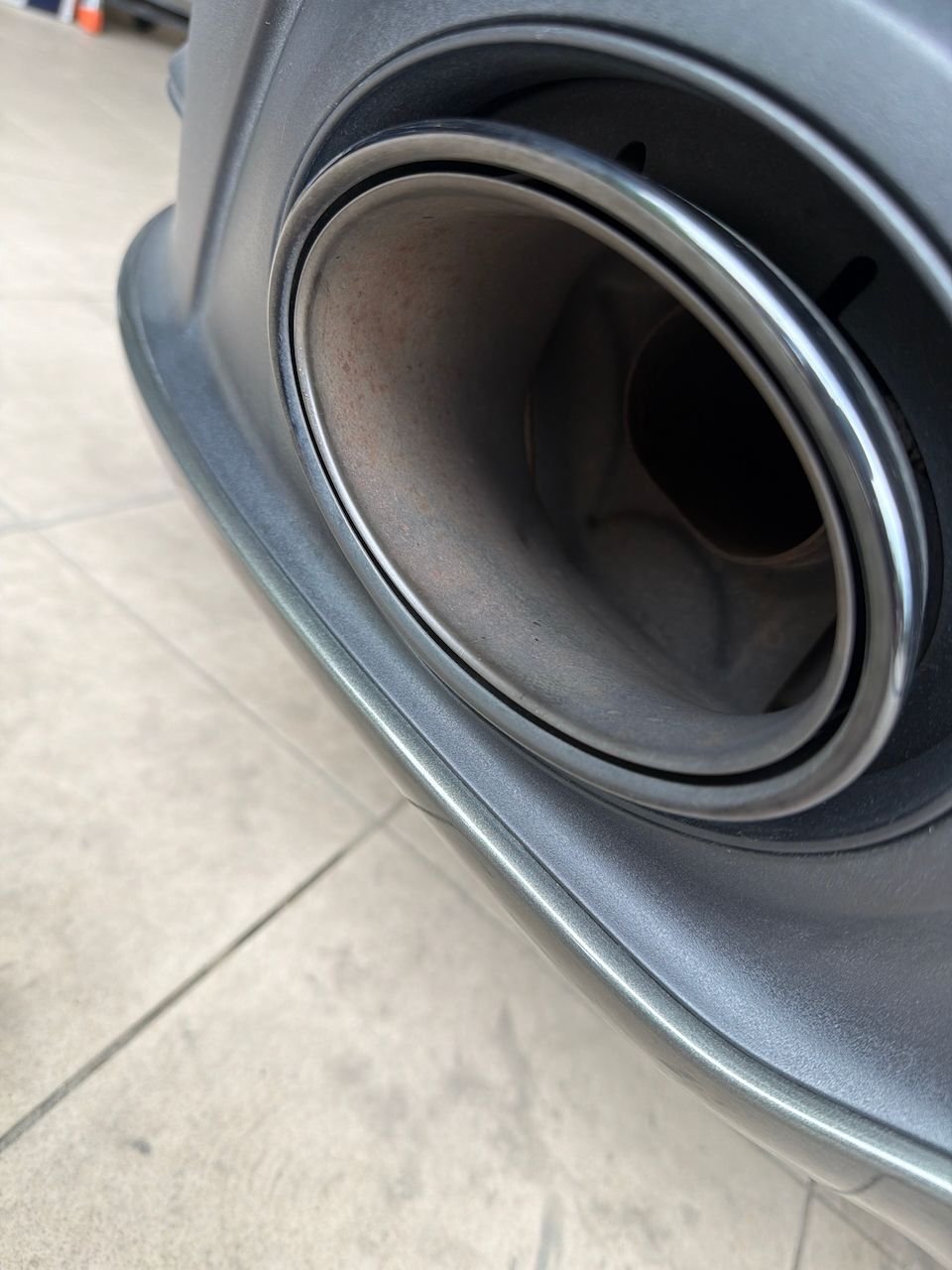 How to clean this rusty/brownish residue inside my 911 exhaust tips ...