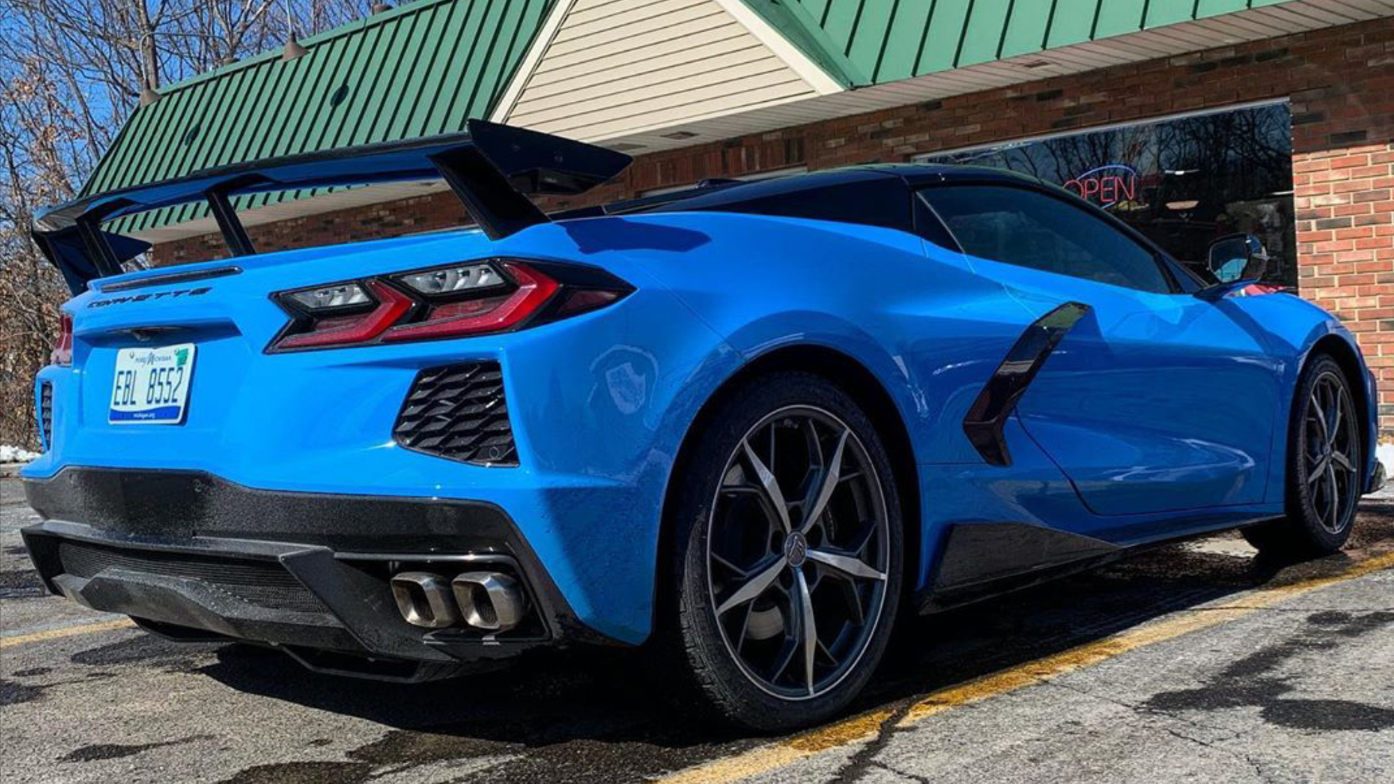 Corvette C8 hard top convertible with a high wing spoiler ...