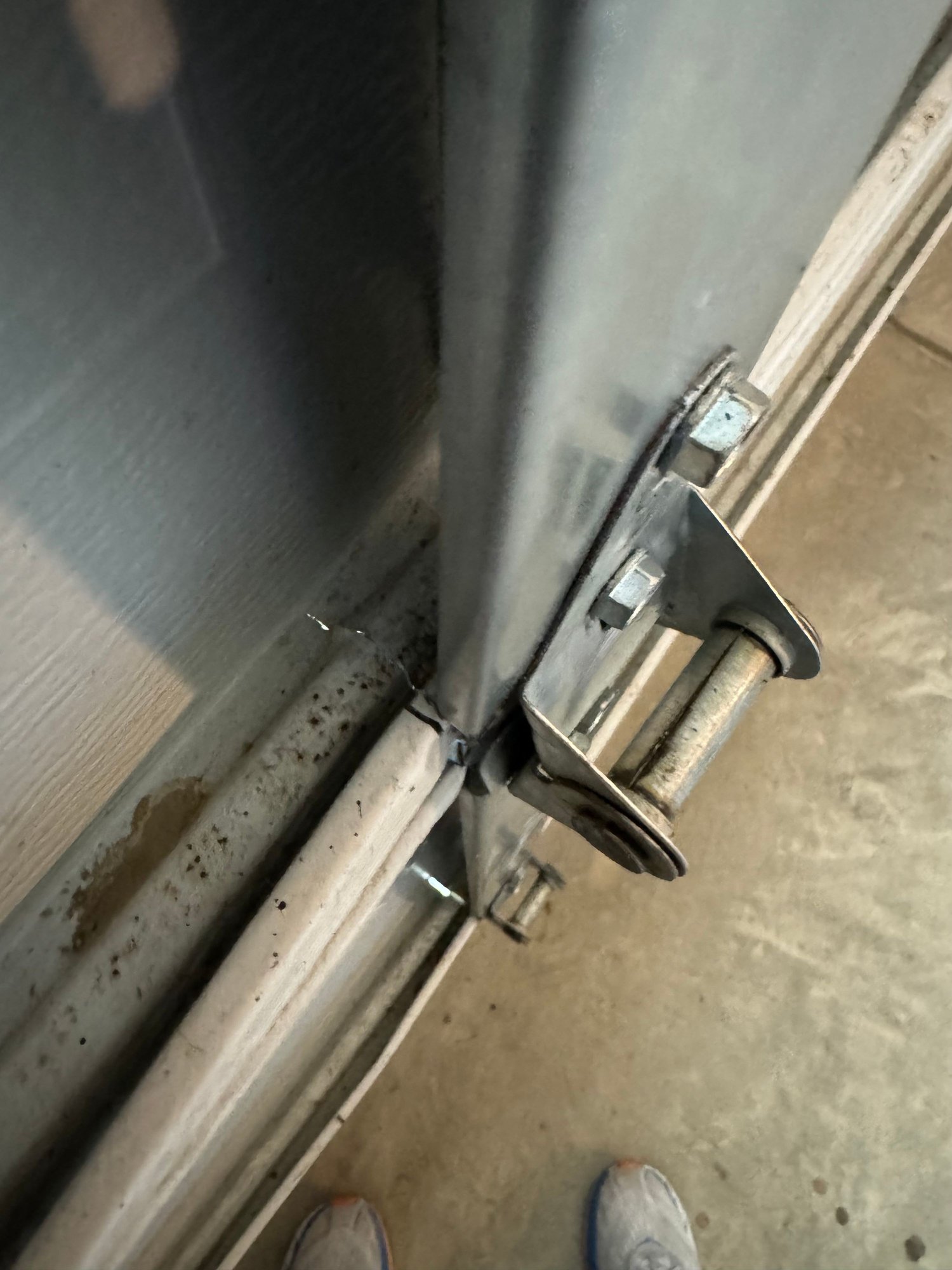 Garage door buckled - DoItYourself.com Community Forums