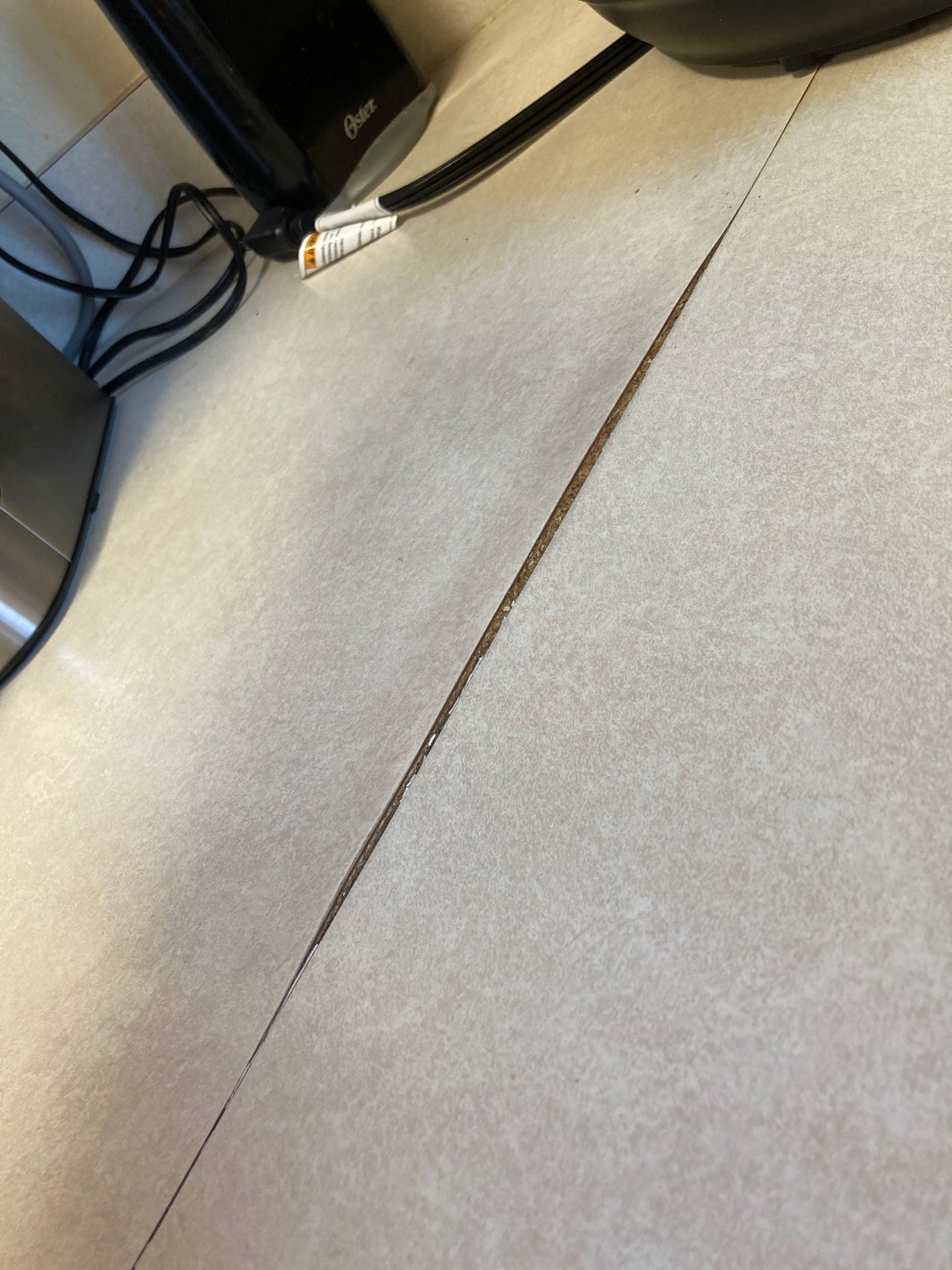 Warped Formica countertop seam - DoItYourself.com Community Forums