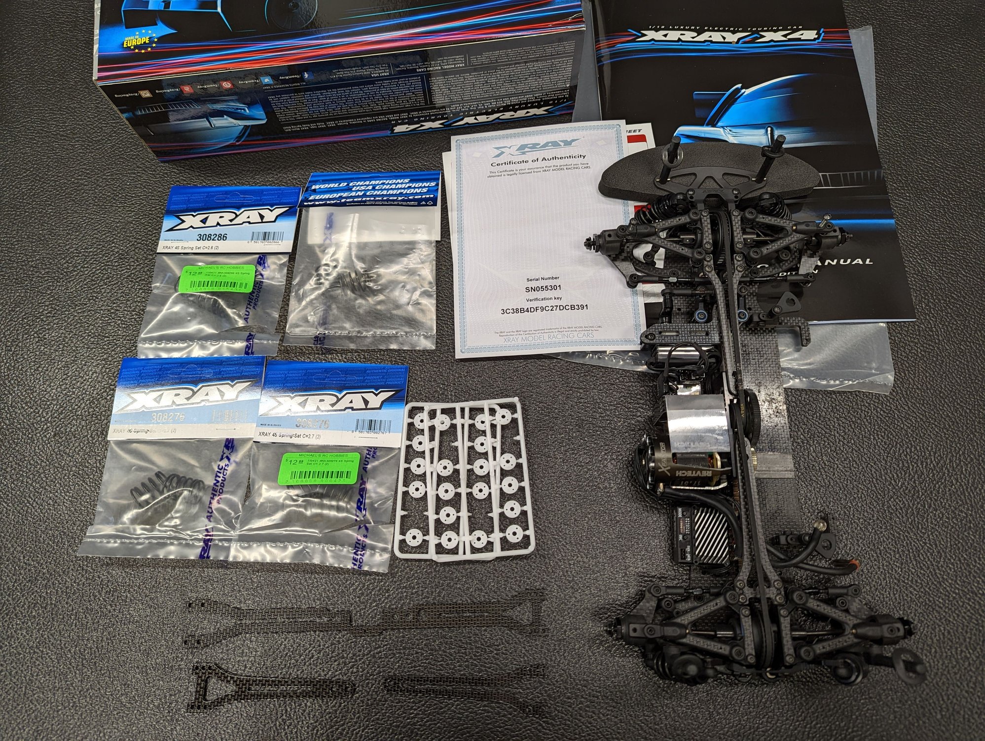 Xray X4 Graphite Excellent + Extras, Springs, CF Split Decks, CF Arms ...